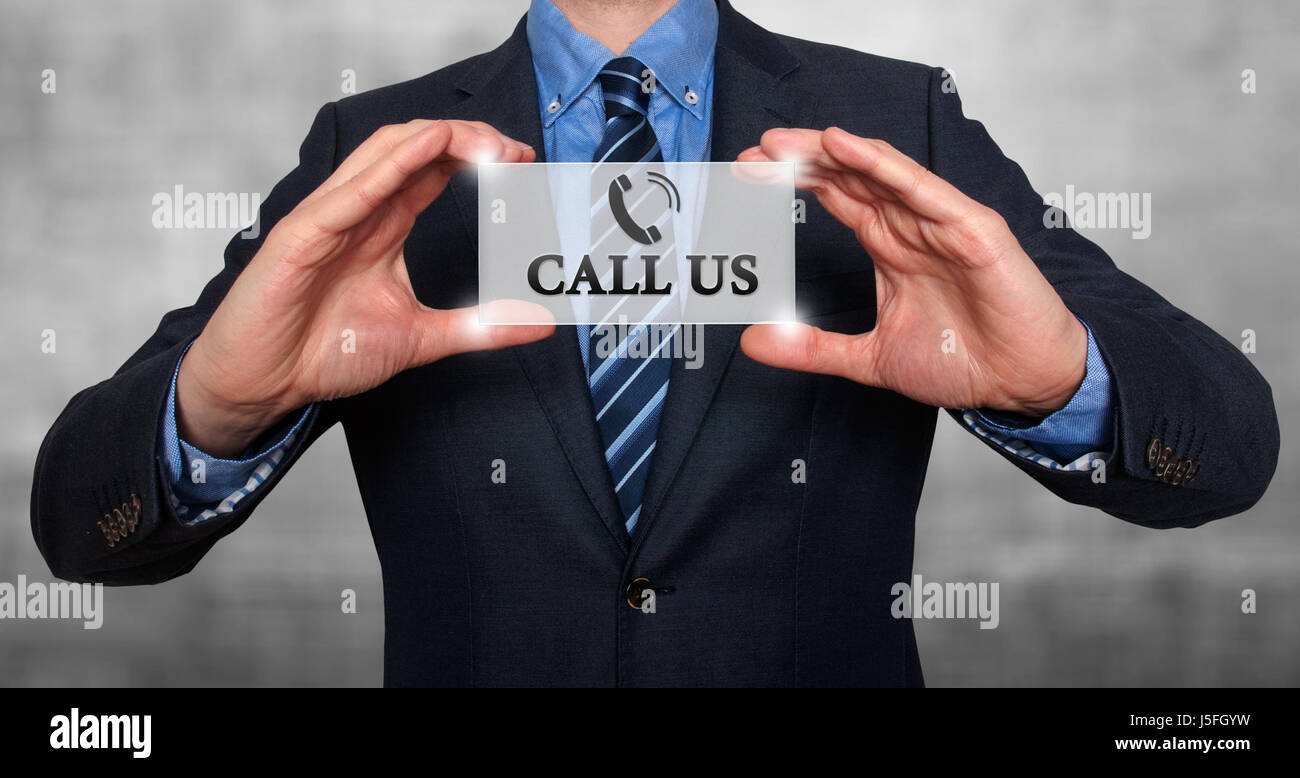 Businessman showing card with Call Us text. - Phone Call icon ...