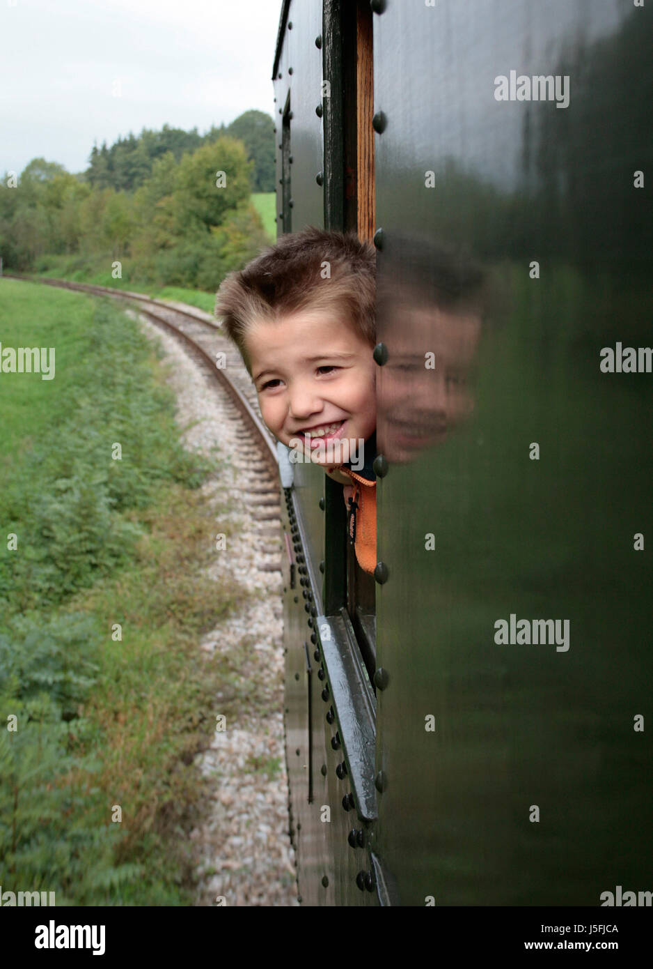 a boy on the train Stock Photo - Alamy
