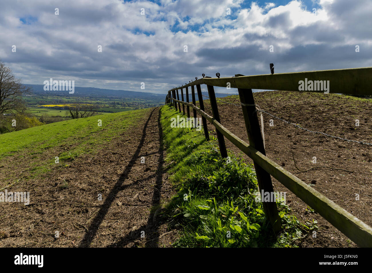 Timber and Barbed Wire fence running alongside a footpath Stock Photo ...
