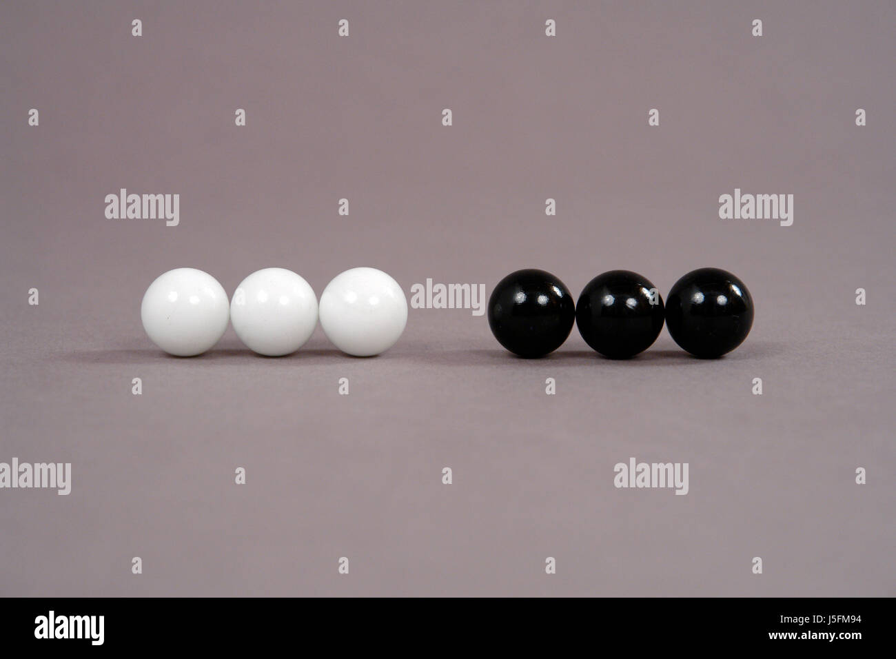 three to three Stock Photo - Alamy