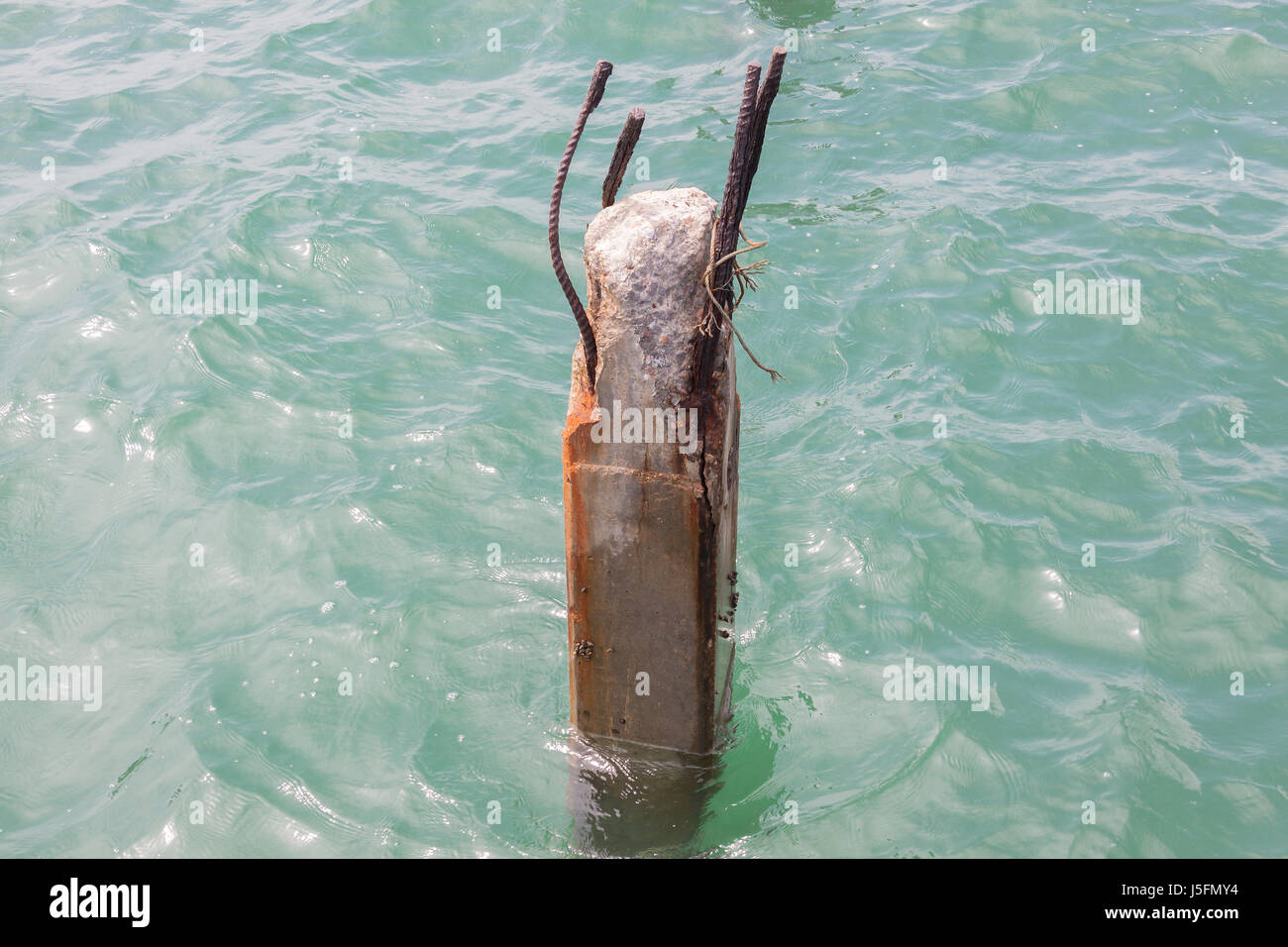 Cement pillars disintegrated Stock Photo - Alamy