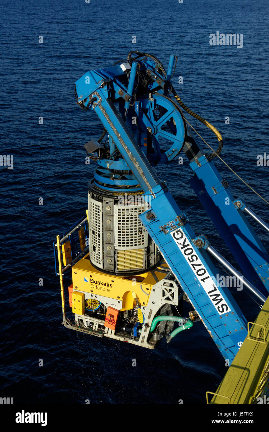 A Remotely Operated Vehicle (ROV) is deployed from a vessel in the ...