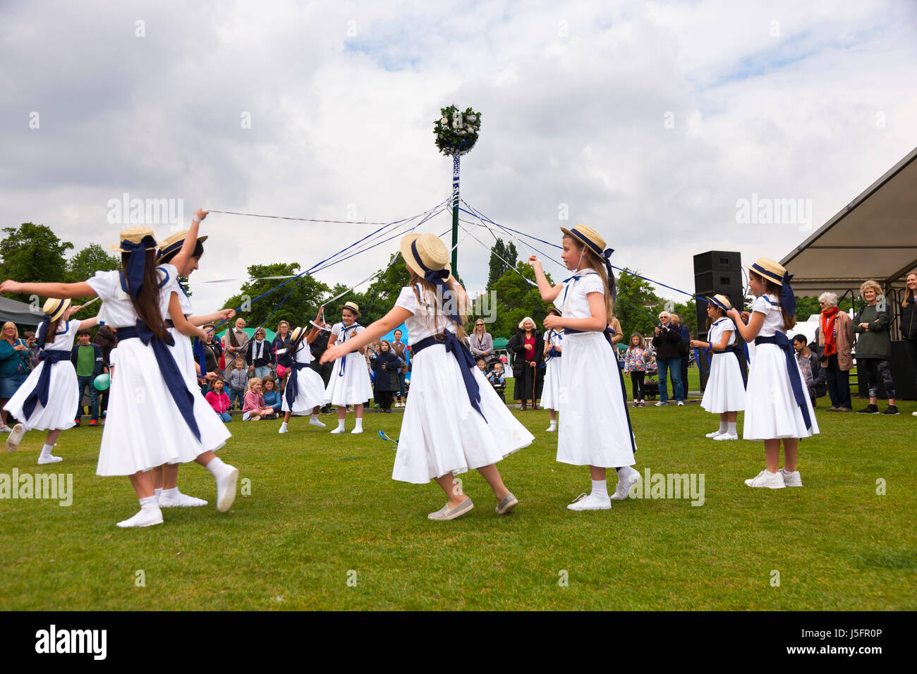 Children / girls / kids / child dancing around the Maypole at the ...