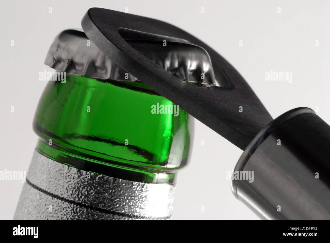 open a beer bottle Stock Photo - Alamy