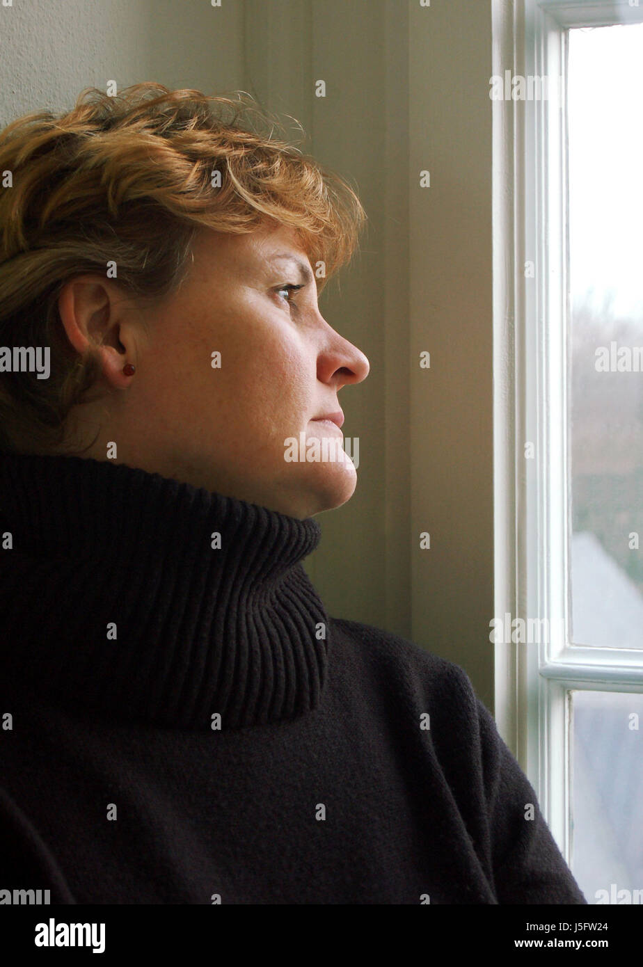 woman wait waiting inside window porthole dormer window pane dreamy ...