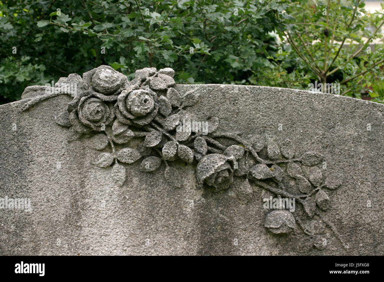 grave stone with roses Stock Photo - Alamy