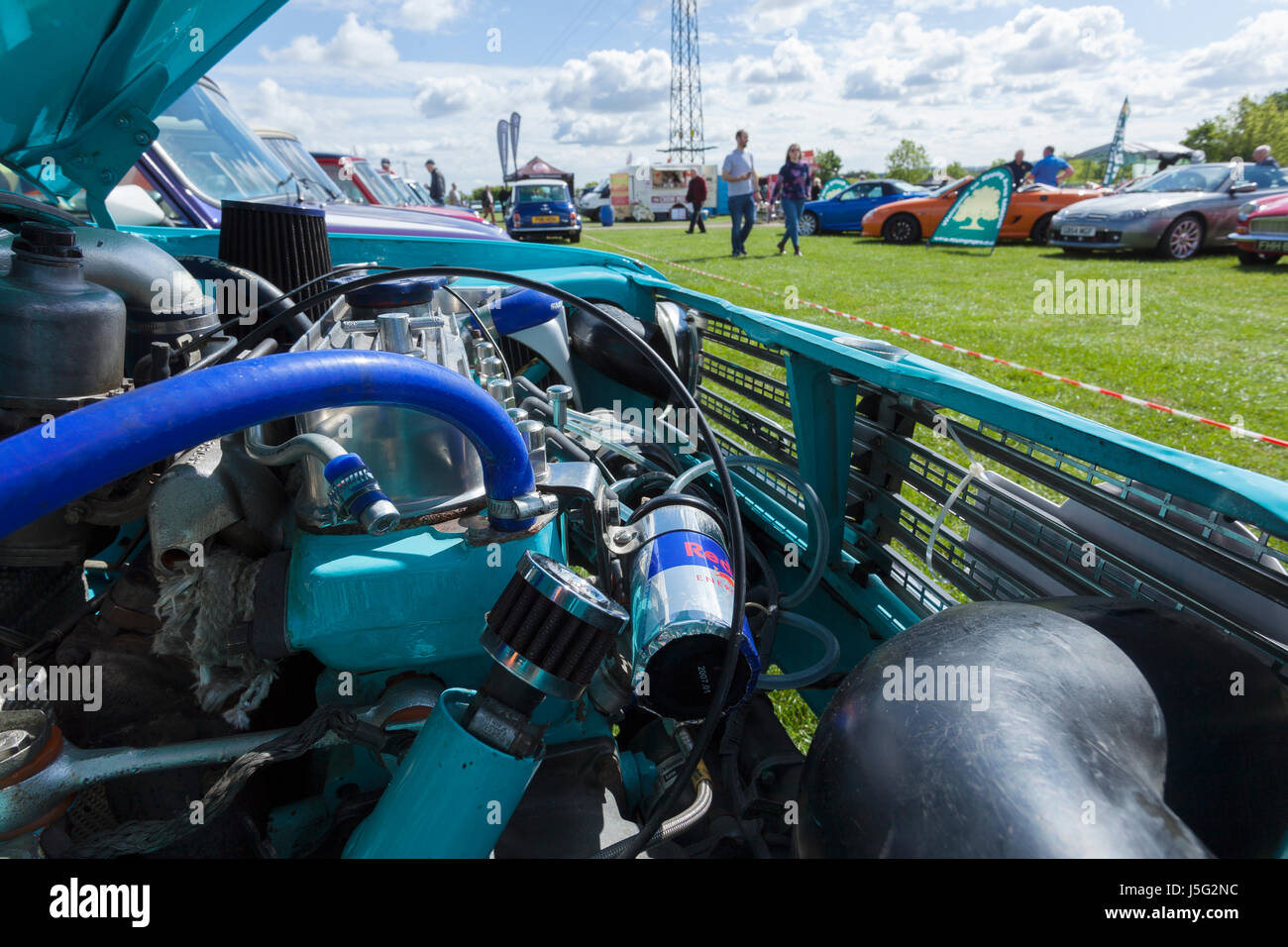 Engine of Classic Mini Car with Long View Through Raised Bonnet with ...