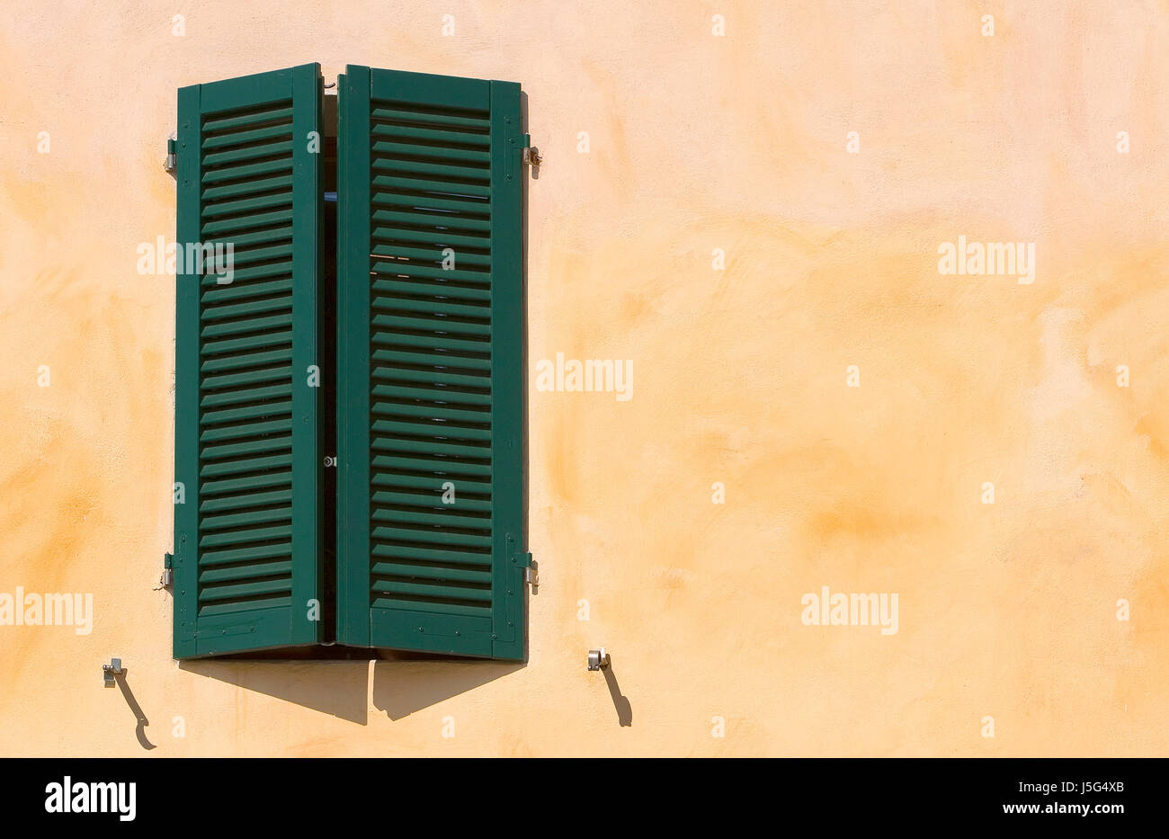 window porthole dormer window pane wood tuscany shutters house wall ...