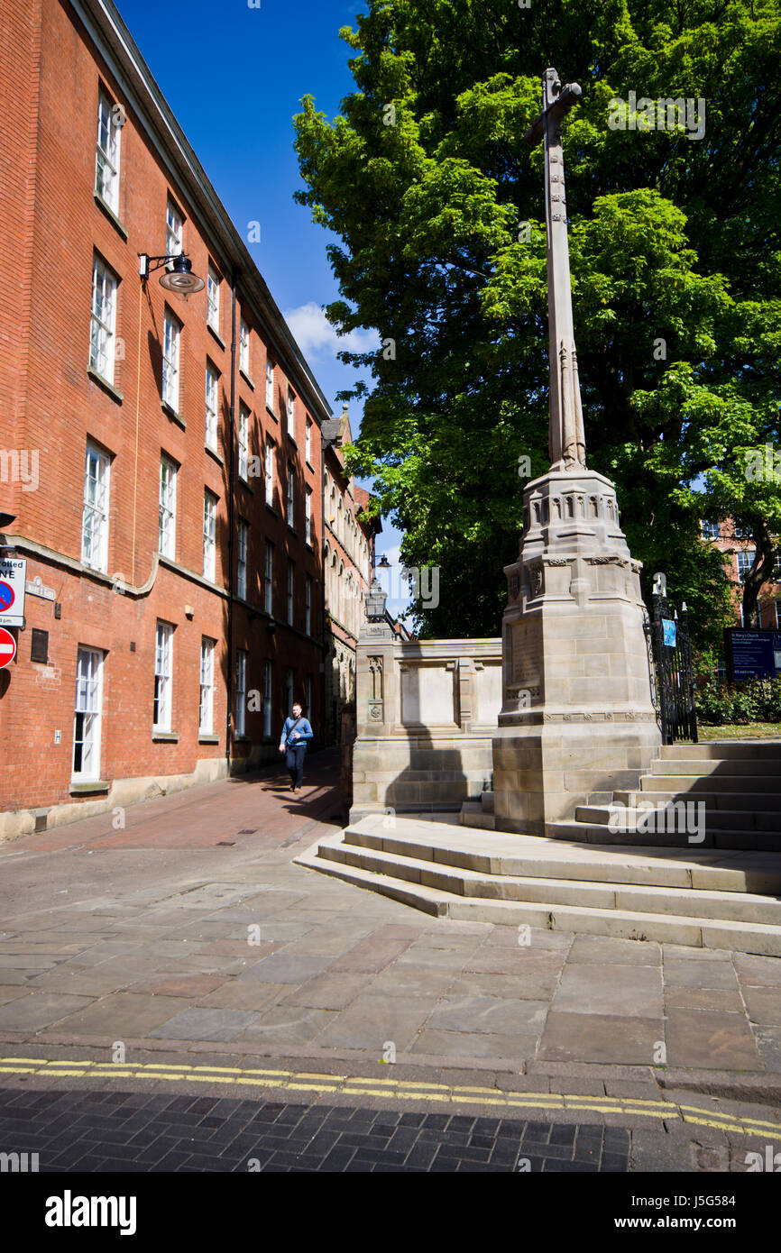 The cross at the entrance to St Mary's church in the Lace Market area ...