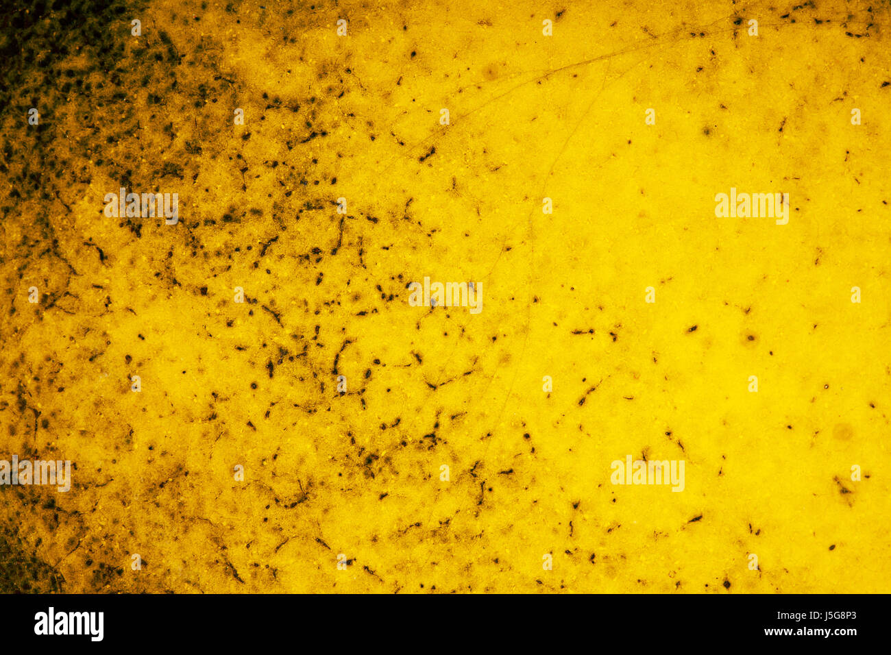 Yellow cracked enamel texture background Stock Photo - Alamy