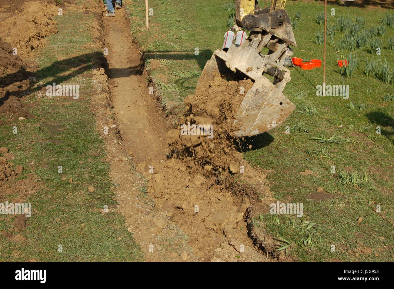 conductions cover trench pour in padding heavy labour machine work ...