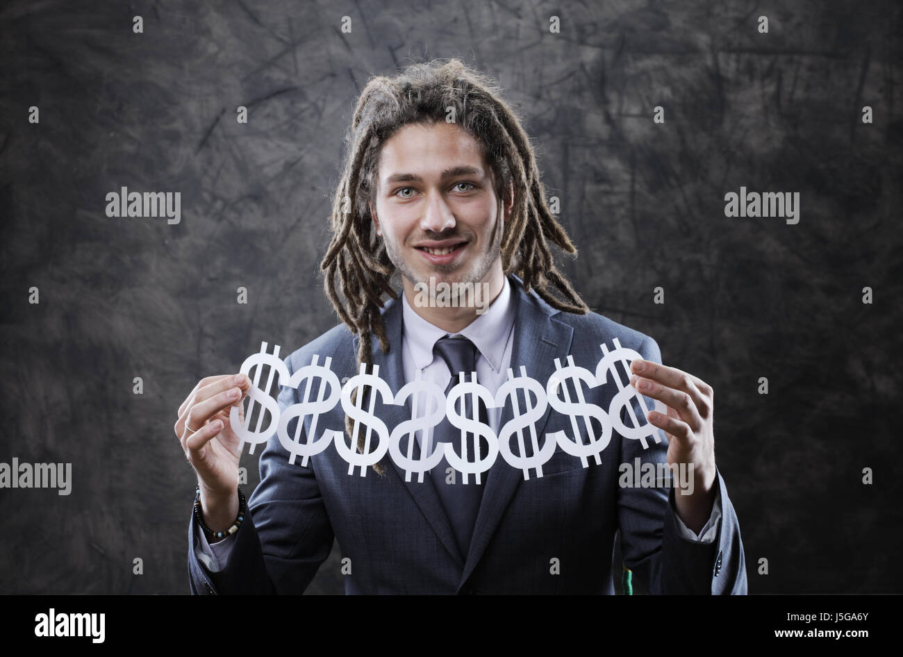 Rich businessman get dollar money from a gain Stock Photo - Alamy