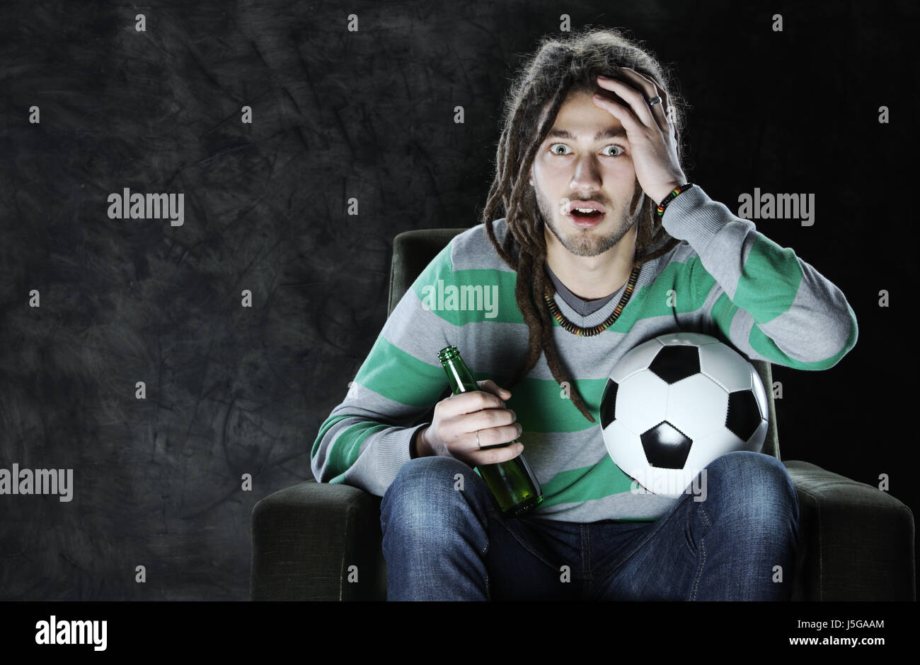 Soccer Failure.Young adult man watching football on television Stock ...