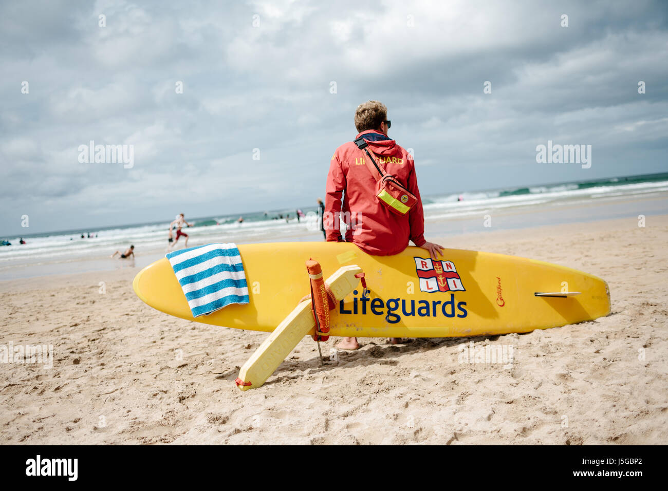 Australian RNLI Lifeguard keeping a watch over Gwithian beach in ...