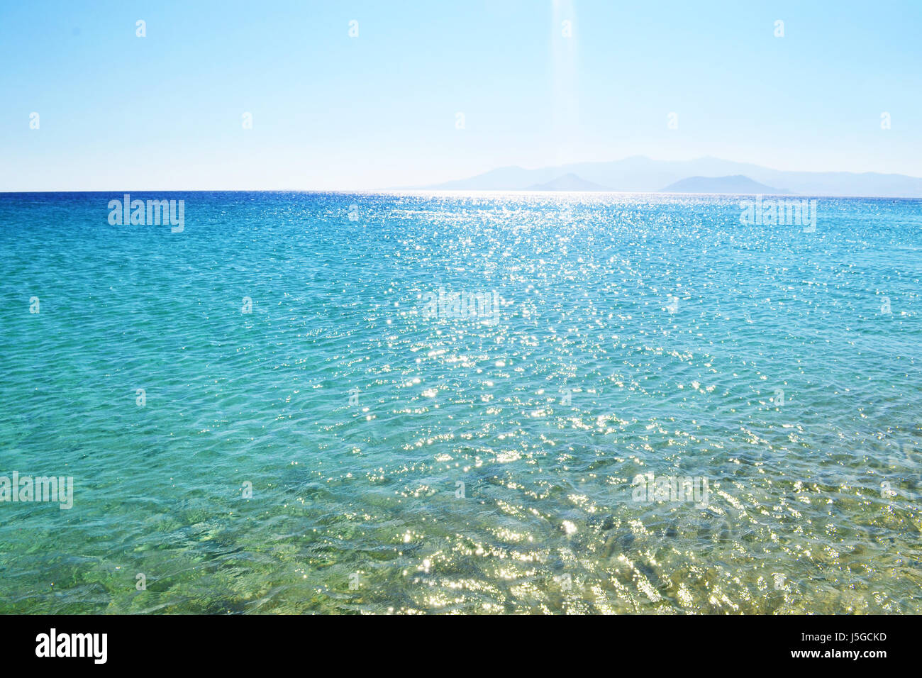 sunbeams on Aegean sea Naxos island Greece Stock Photo - Alamy