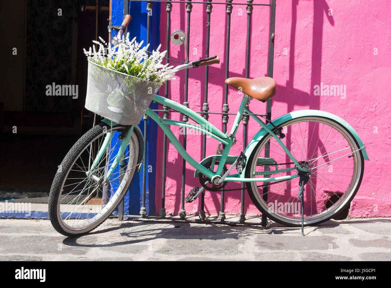 vintage bike in old color town Stock Photo - Alamy