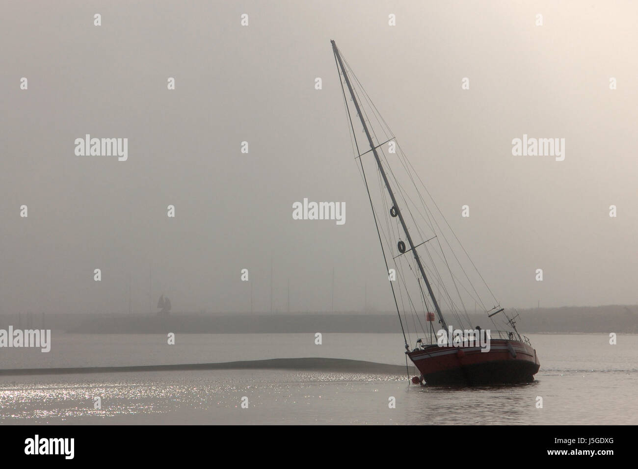 fog sail aground sailing boat sailboat nebulous low tide salt water sea ...