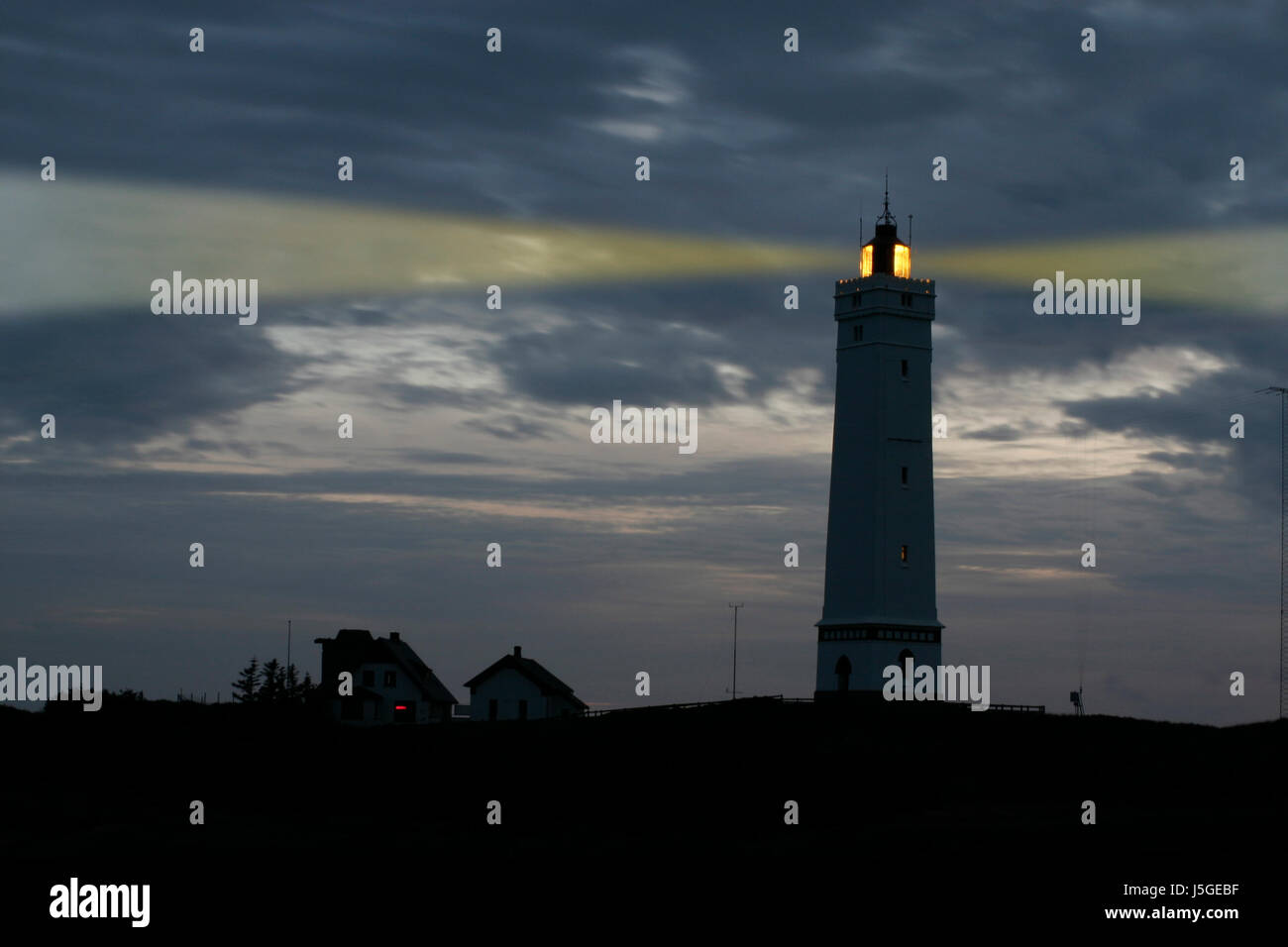 lighthouse at dusk Stock Photo - Alamy