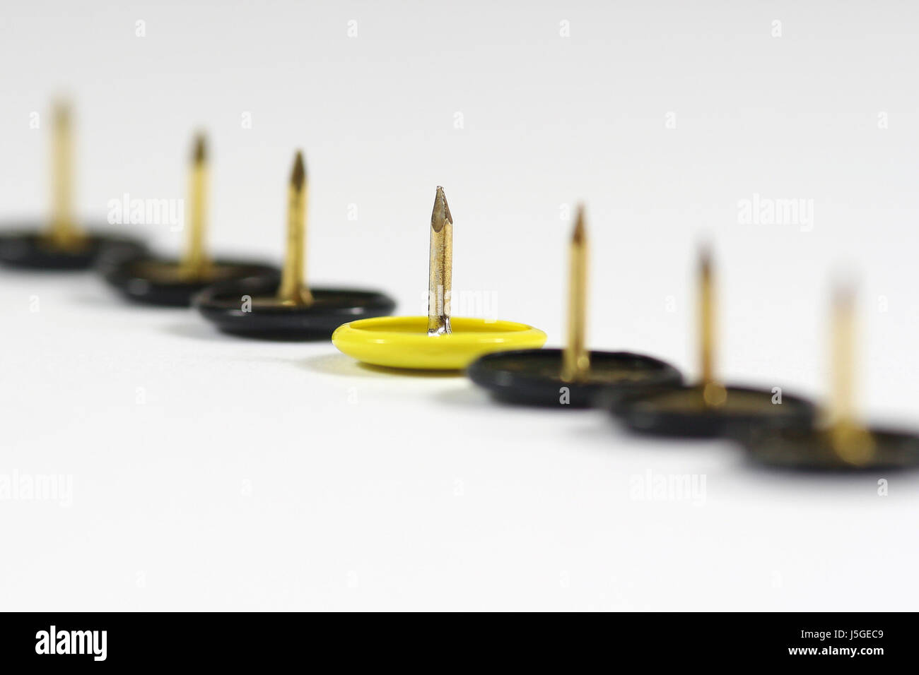 drawing board pins,a game with blur Stock Photo - Alamy