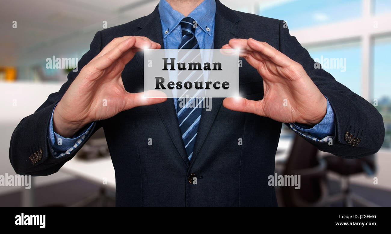 Businessman holding Human Resource sign. Office - Stock Photo Stock ...