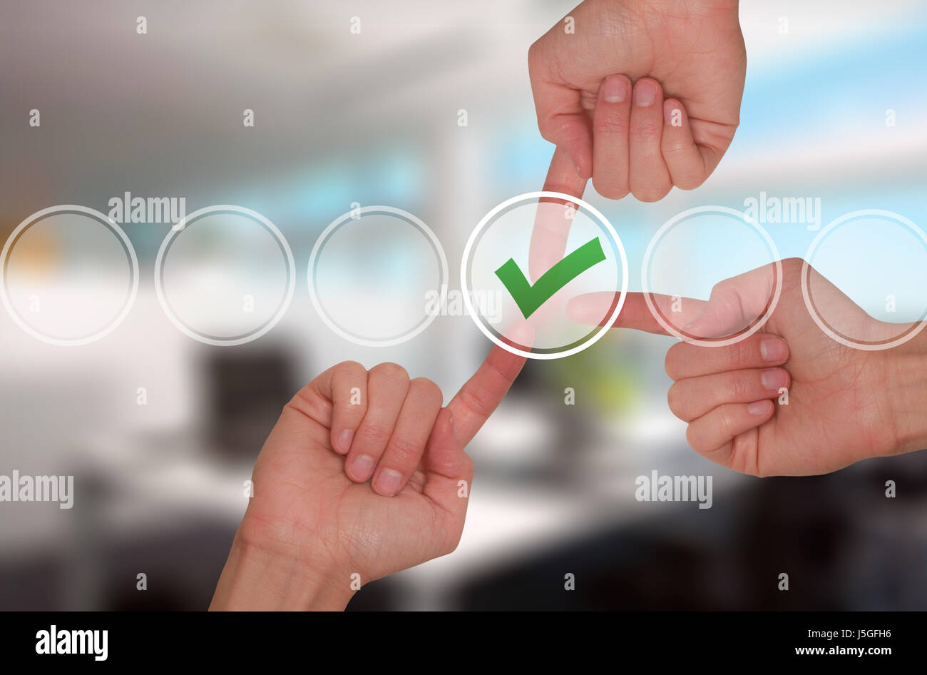 Team work hands touching check mark on virtual screen. Business ...