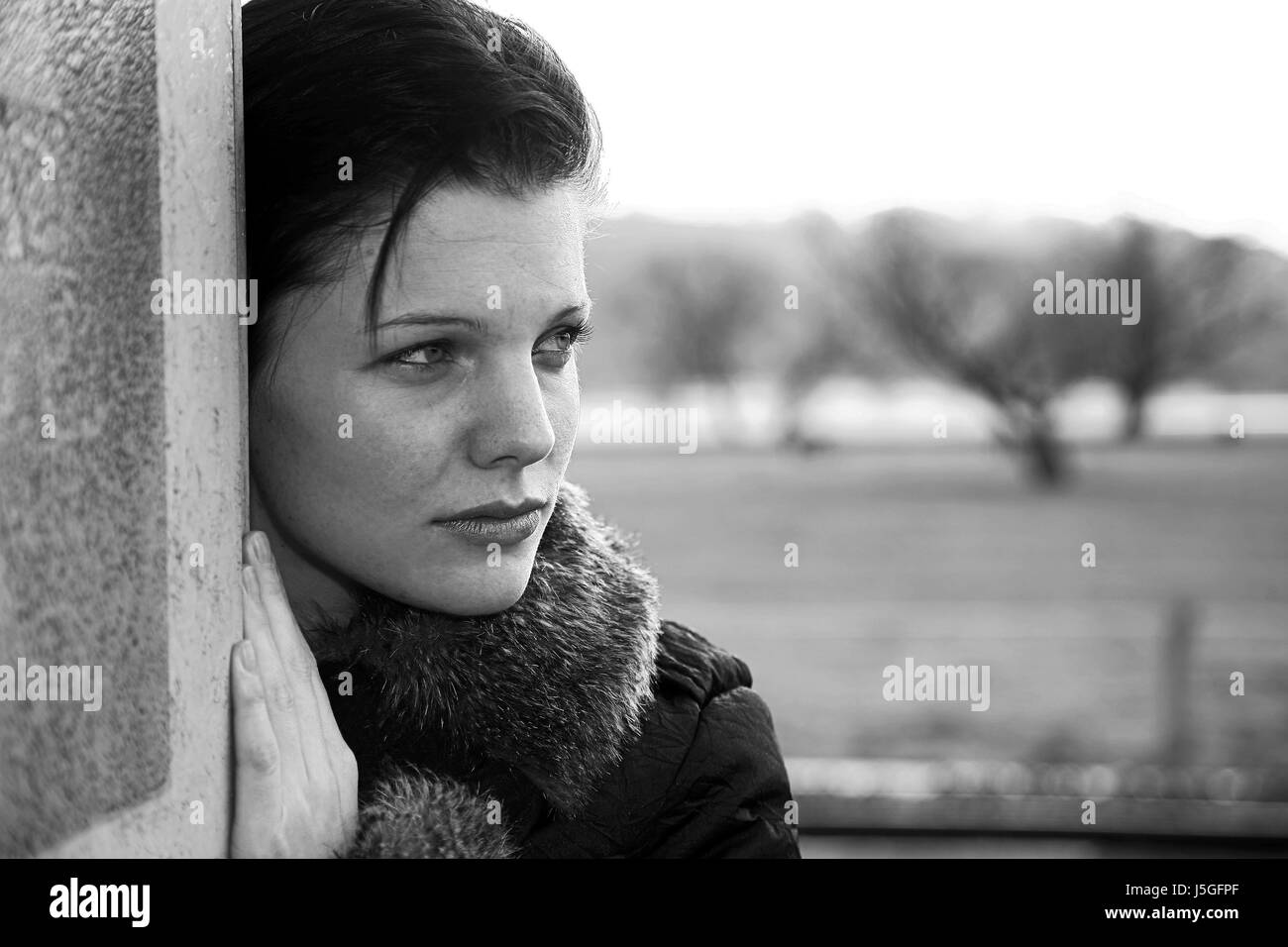 woman hand mouth future face portrait meditate eyes longing look ...