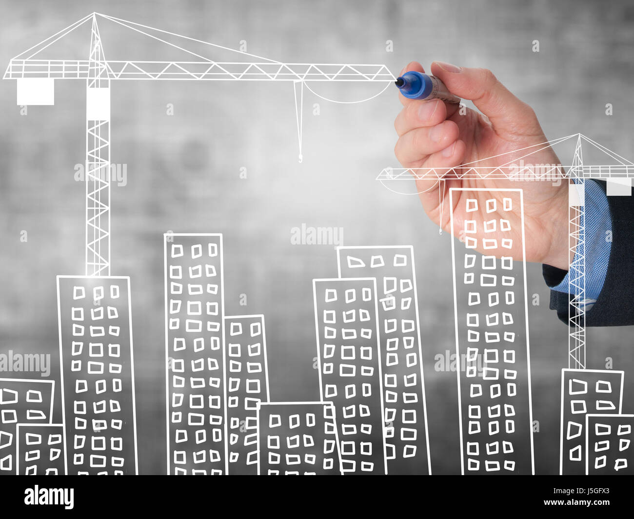Business man draw building and cityscape. Construction site concept ...