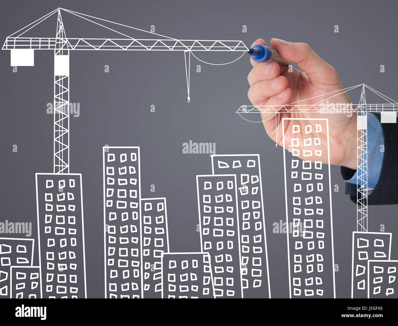 Business man draw building and cityscape. Construction site concept ...