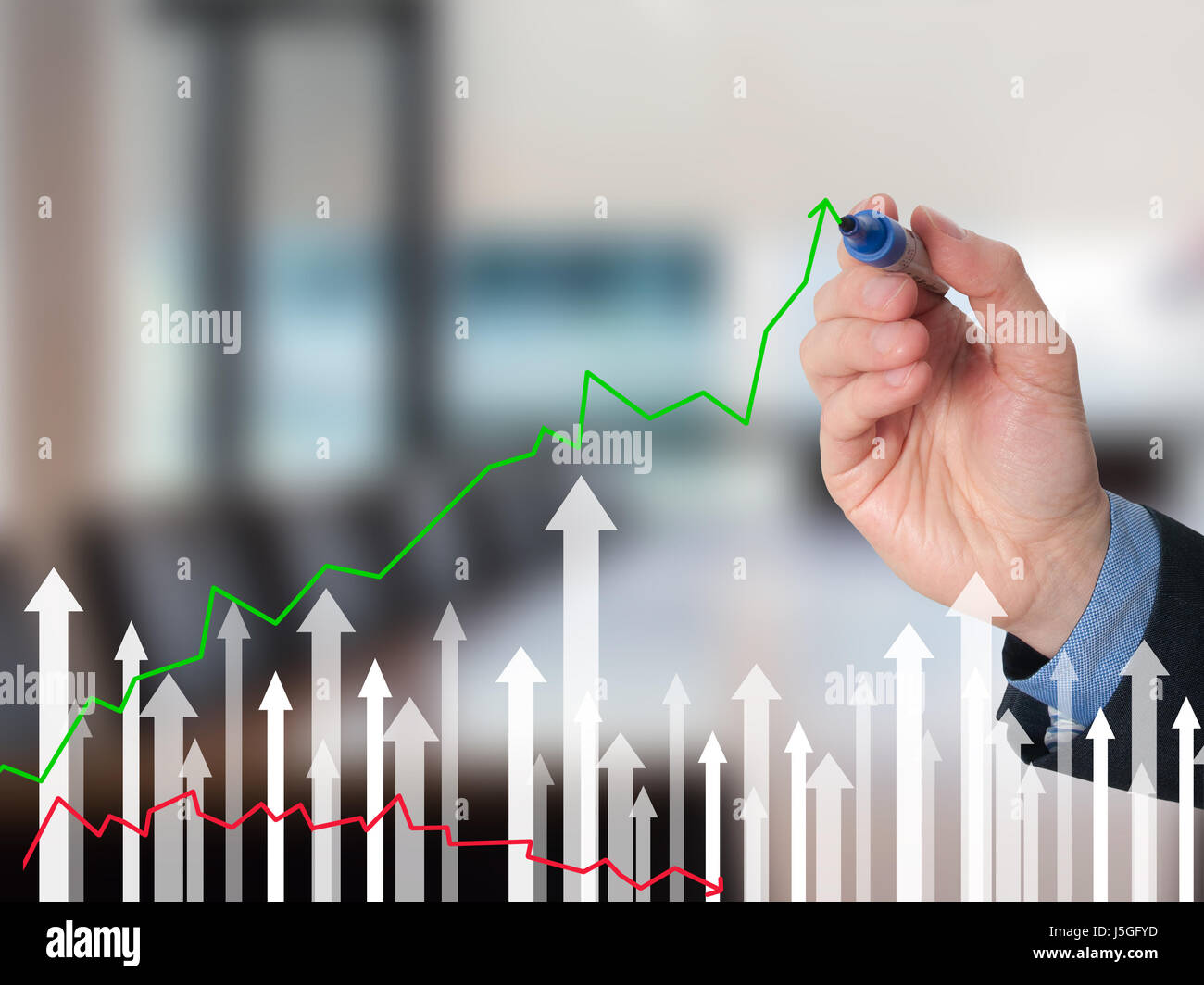 Businessman hand drawing graph of growth on visual screen. Man holding ...