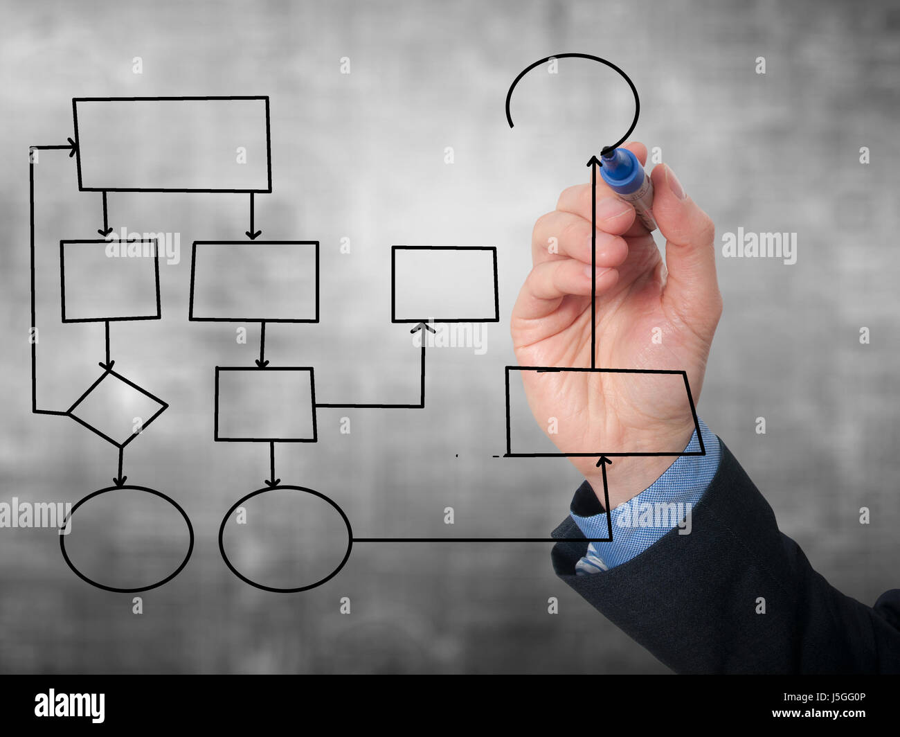 Businessman drawing empty diagram on visual screen. Isolated on grey ...