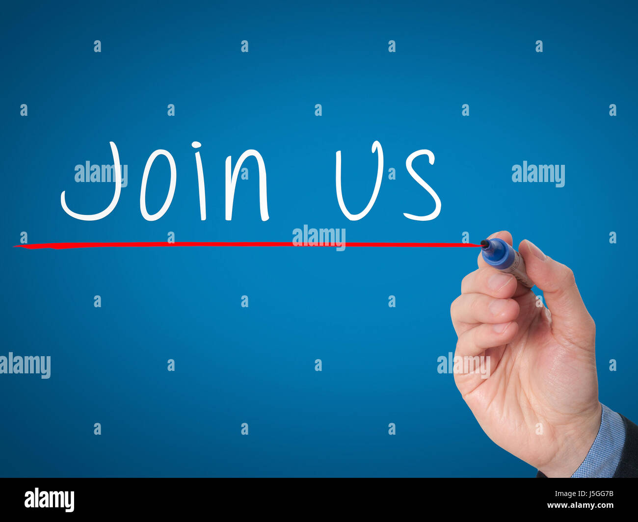 join us words written by businessman hand on a transparent board ...