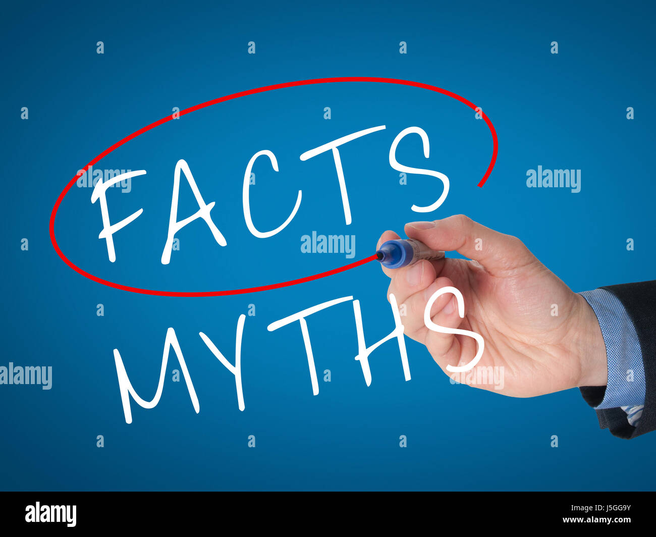 Businessman hand drawing and choosing Facts instead of Myths. Facts ...