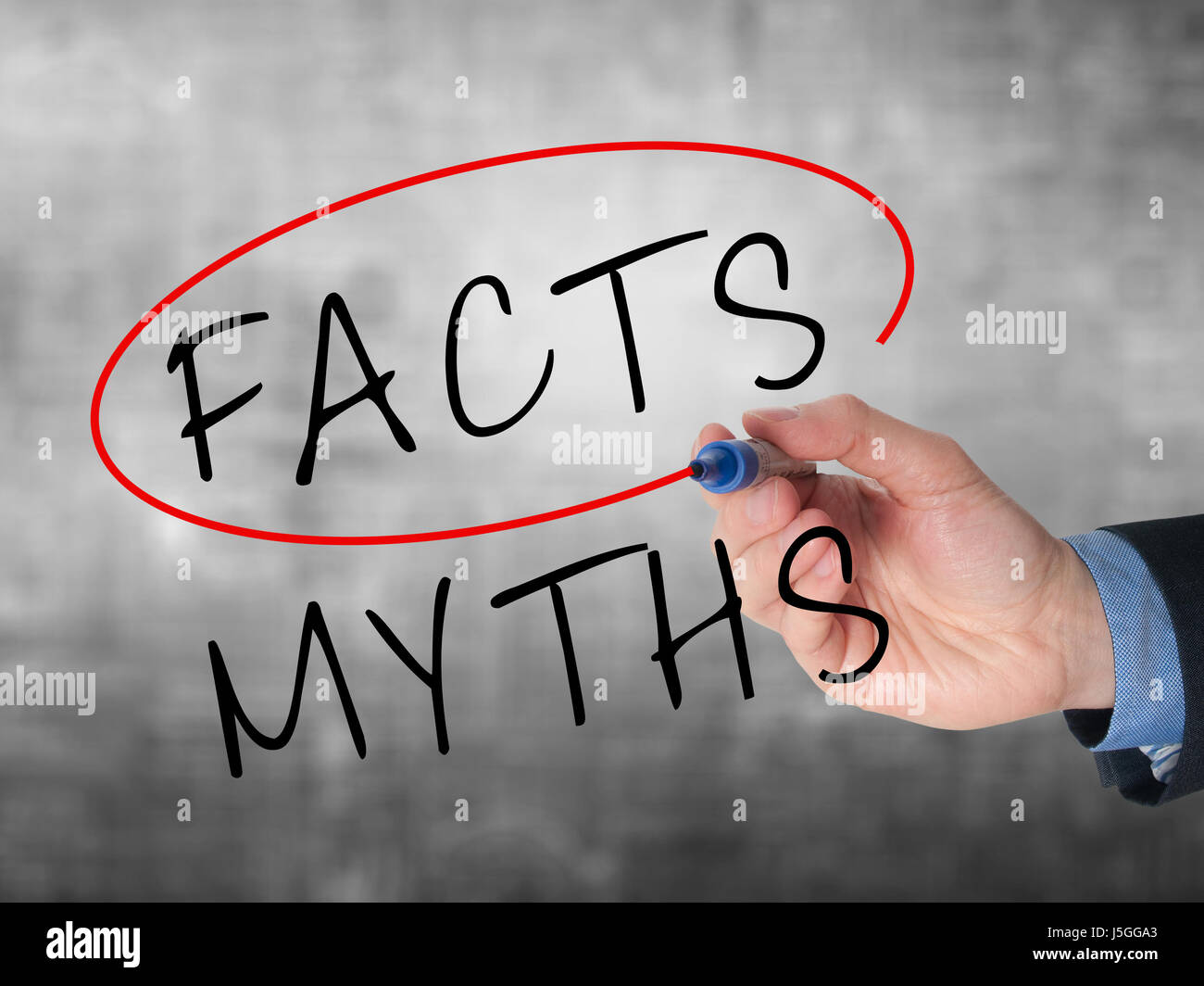Businessman hand drawing and choosing Facts instead of Myths. Facts ...
