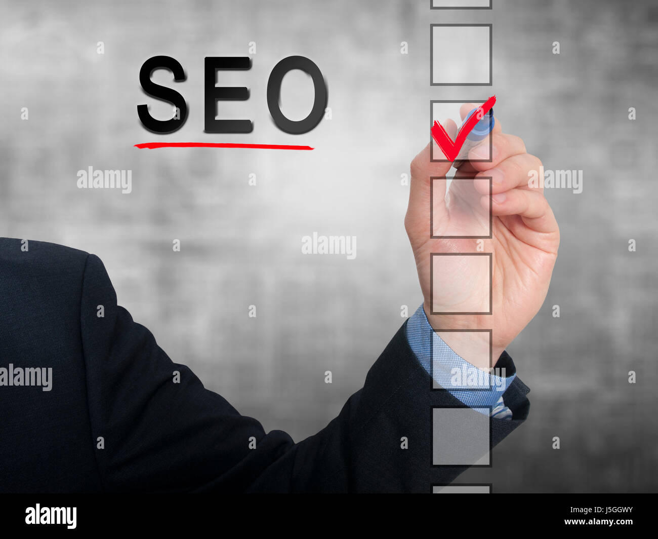 businessman checking mark on SEO checklist marker. Checking SEO ...