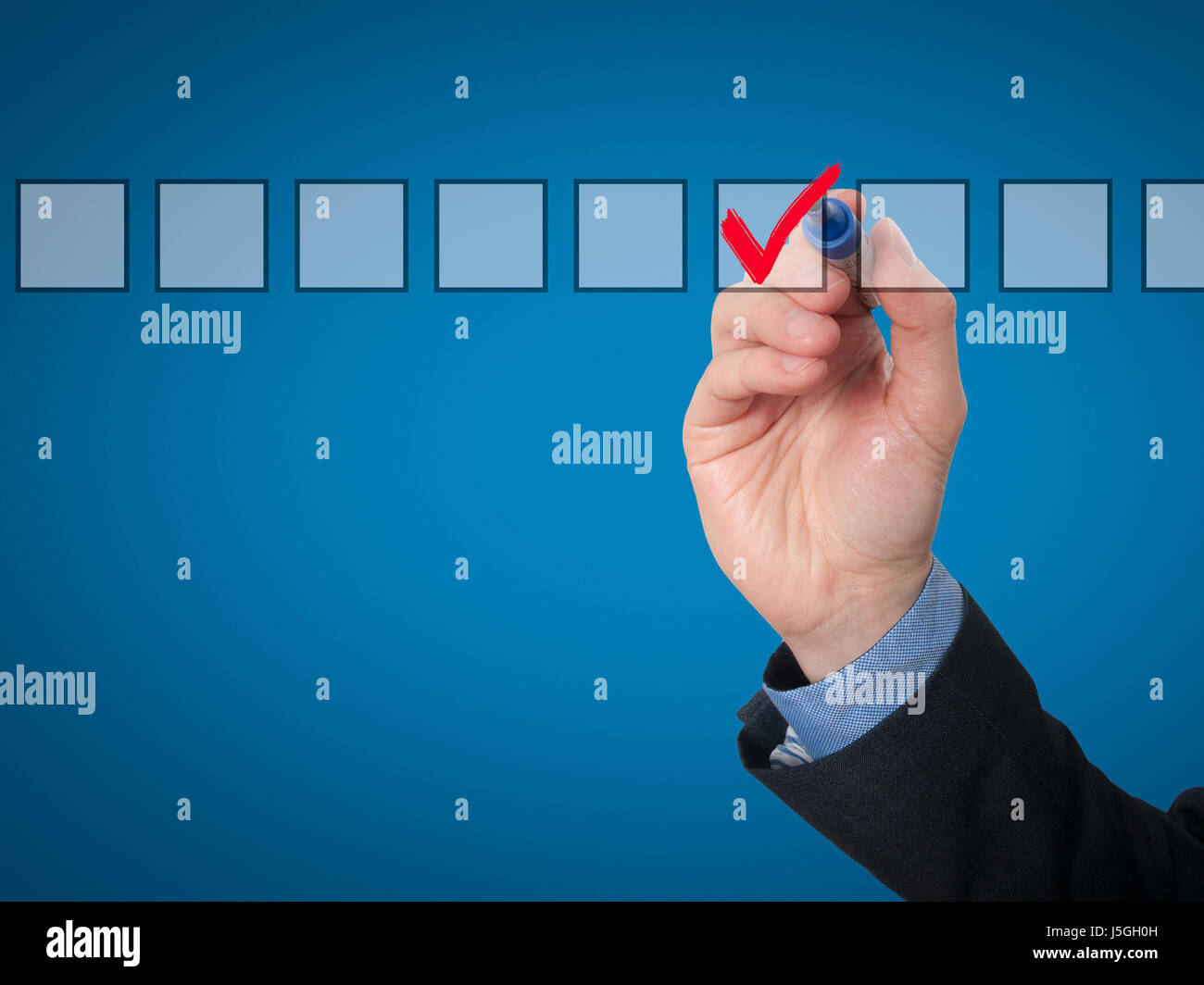 Businessman ticks off in in a square. Task list concept. Isolated on ...