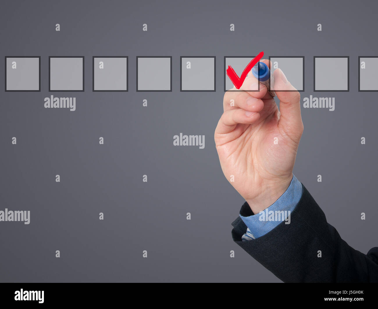 Businessman ticks off in in a square. Task list concept. Isolated on ...