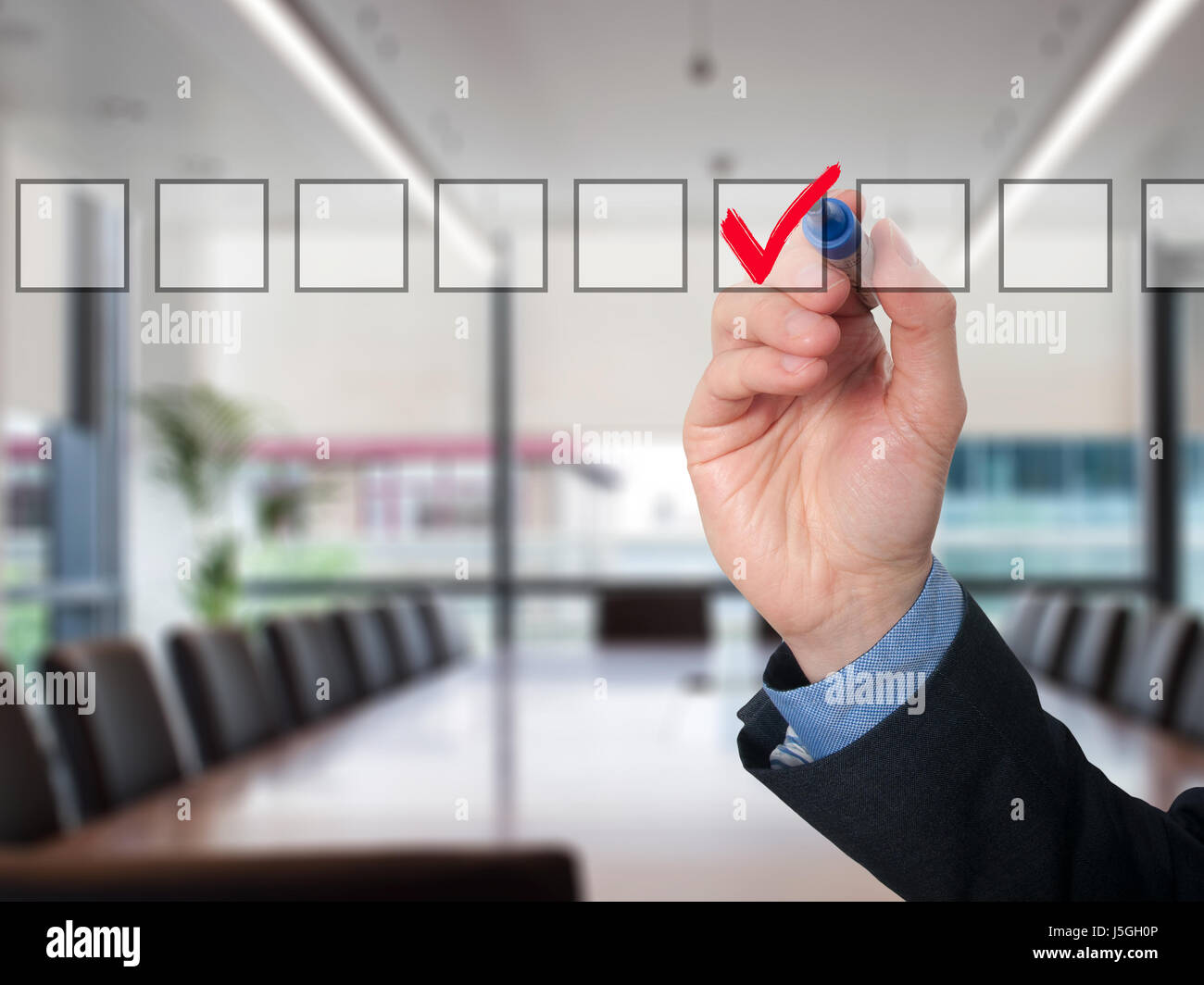 Businessman ticks off in in a square. Task list concept. Isolated on ...