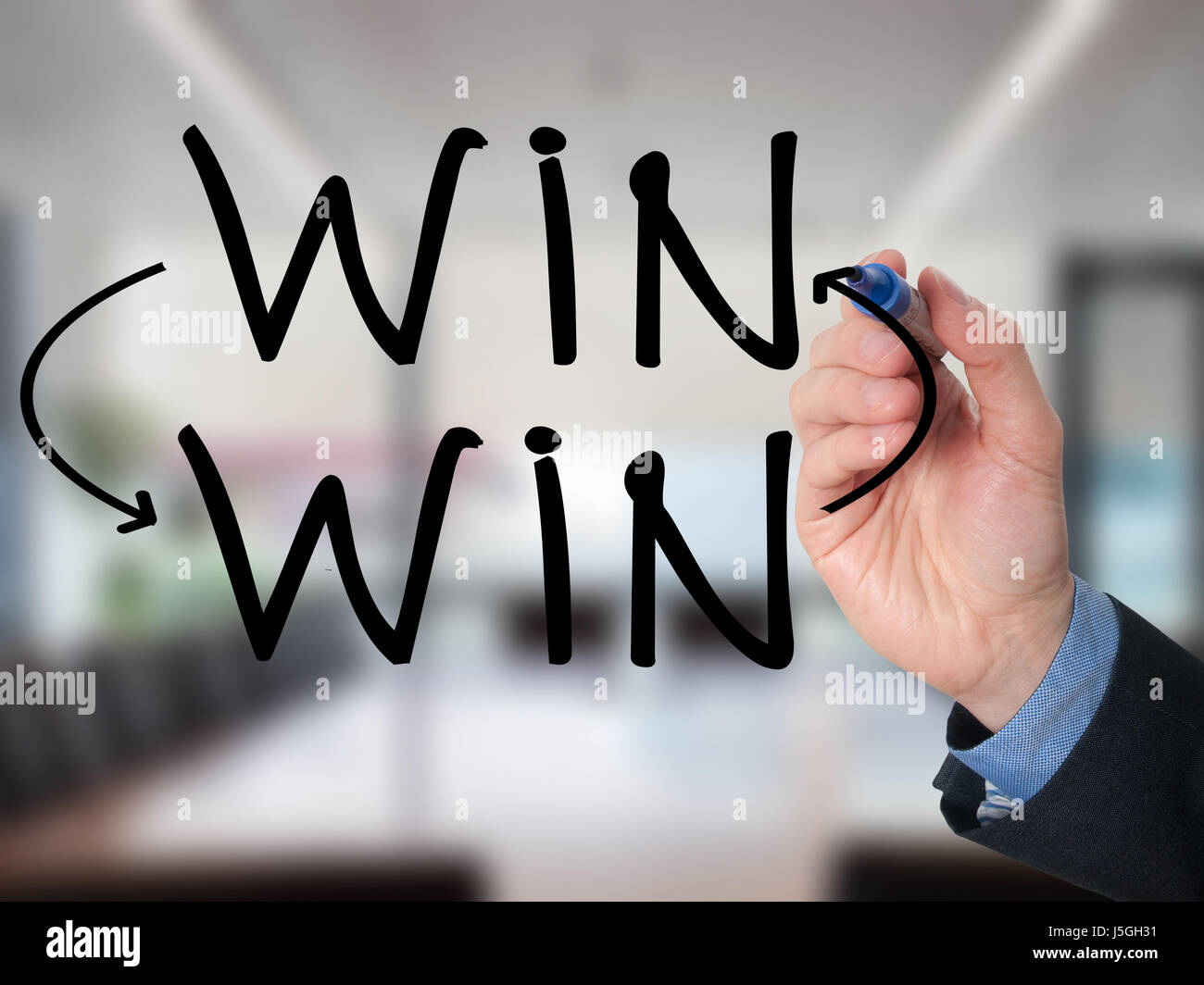 Businessman hand drawing Win Win situation concept with marker on ...