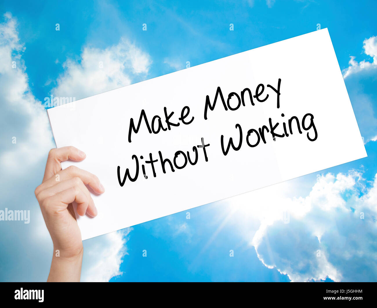 Make Money Without Working Sign on white paper. Man Hand Holding Paper ...