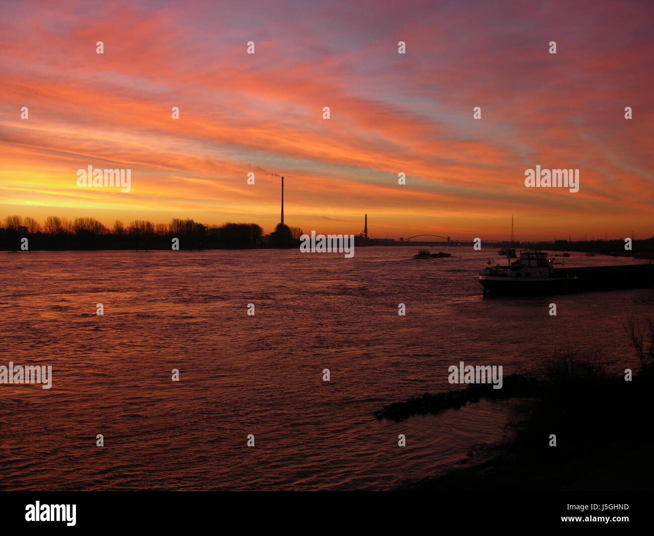 bridge rhine sunrise Duisburg orange red yellow river water sailing ...