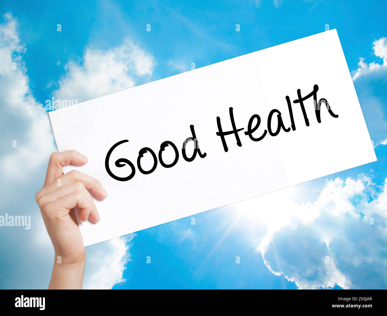 Good Health Sign on white paper. Man Hand Holding Paper with text ...