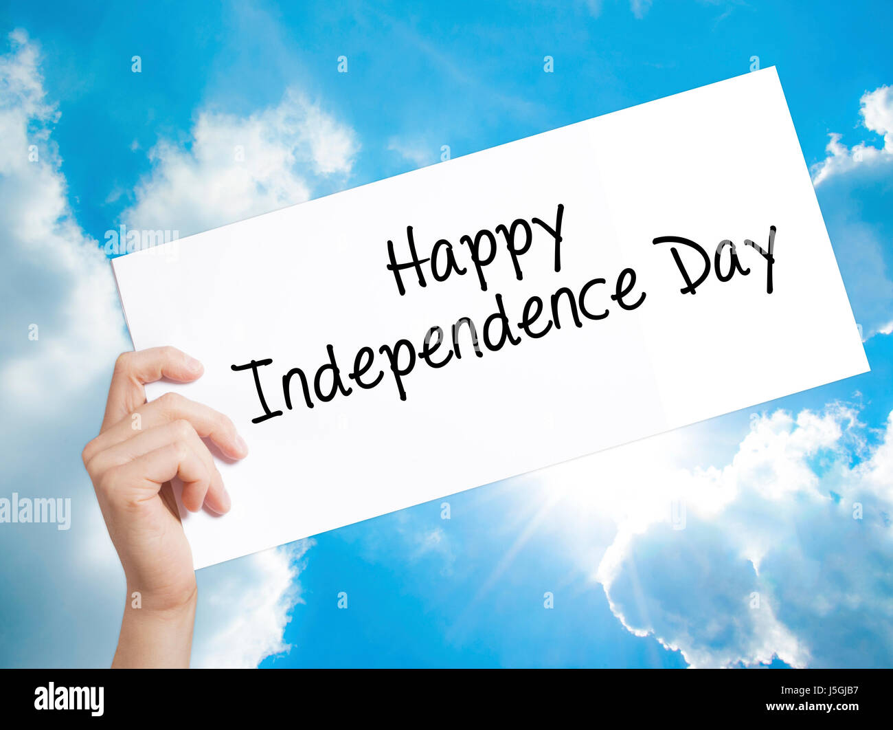 happy Independence Day Sign on white paper. Man Hand Holding Paper with ...