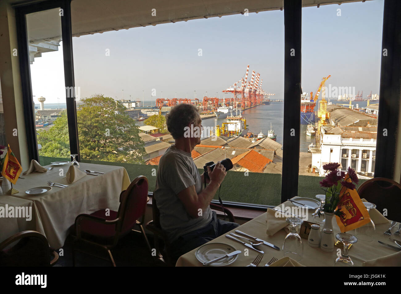 Fort Colombo Sri Lanka tourist taking photograph of the view from Grand ...