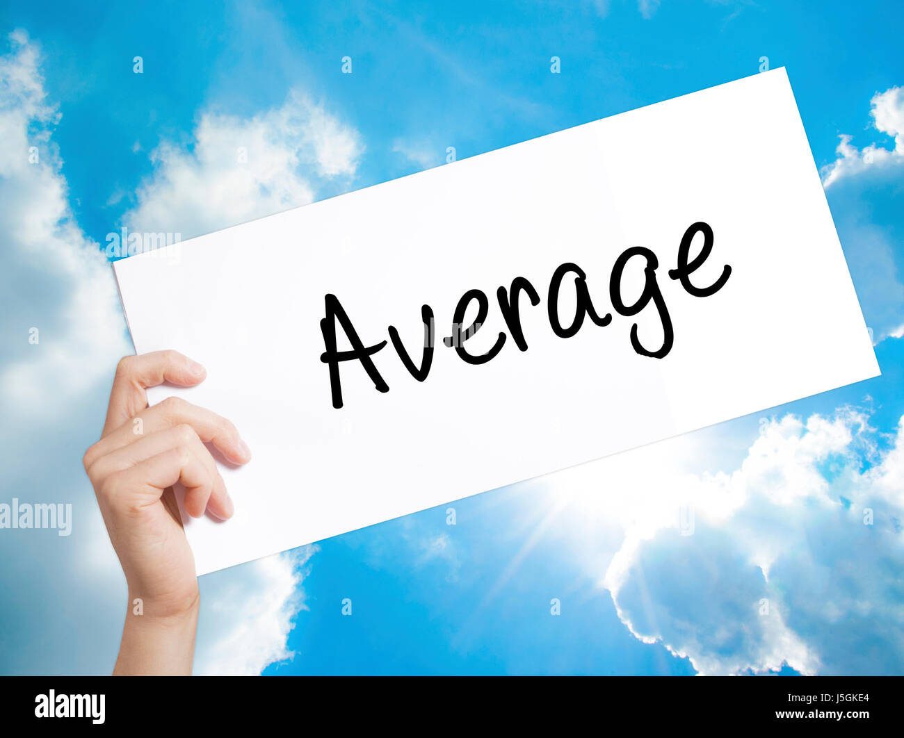 Average Sign on white paper. Man Hand Holding Paper with text. Isolated ...