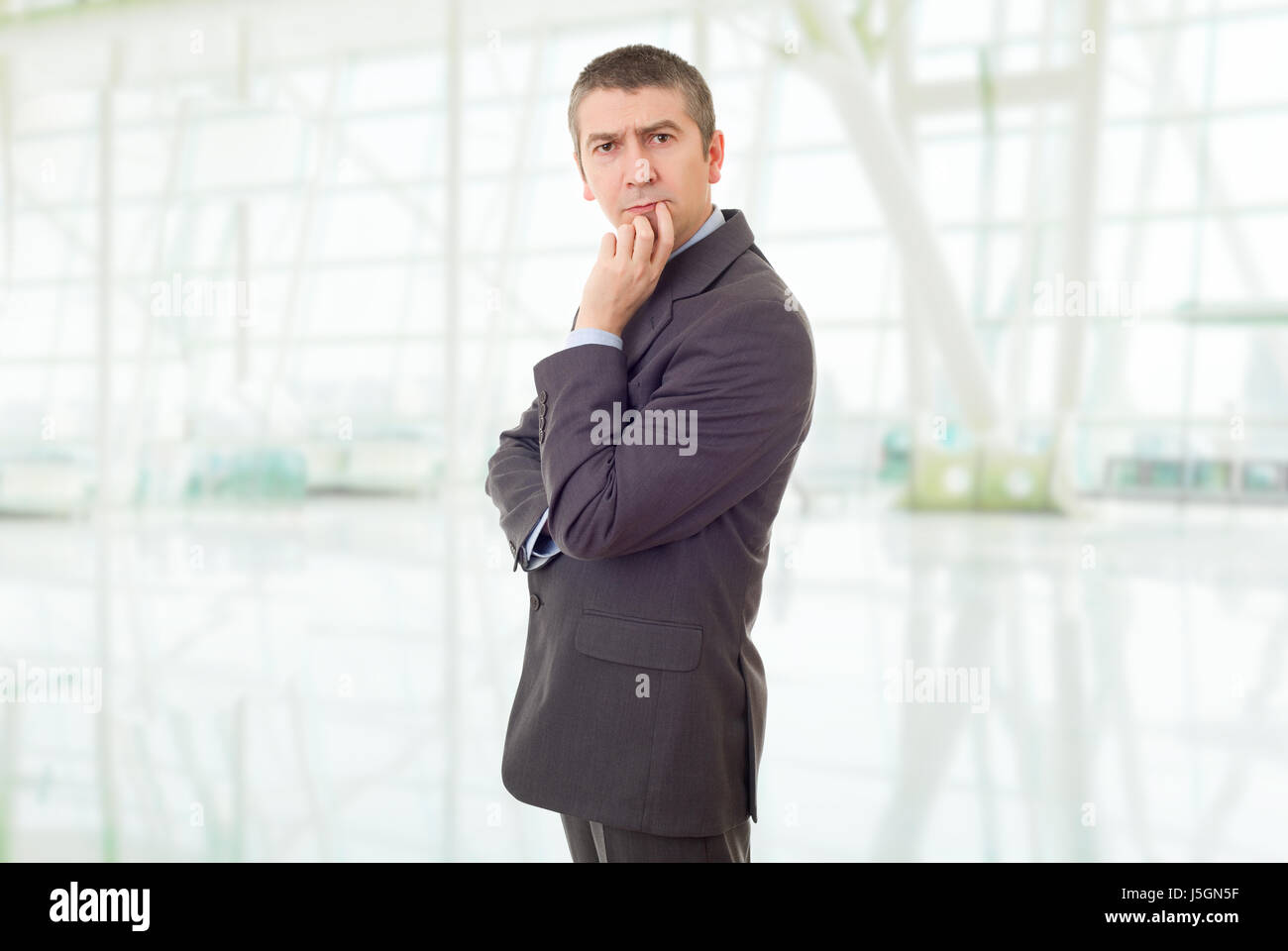 business man thinking, at the office Stock Photo - Alamy
