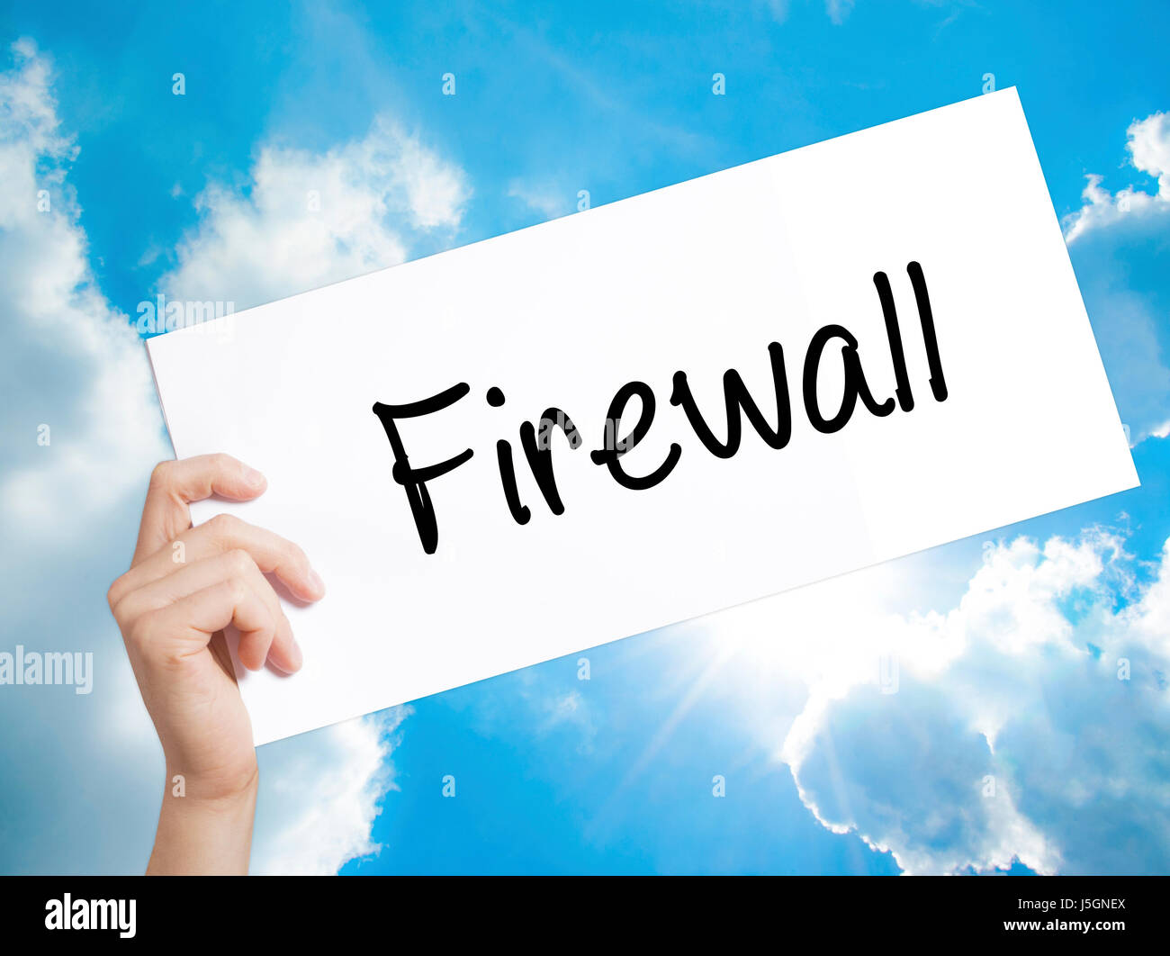 Firewall Sign on white paper. Man Hand Holding Paper with text ...