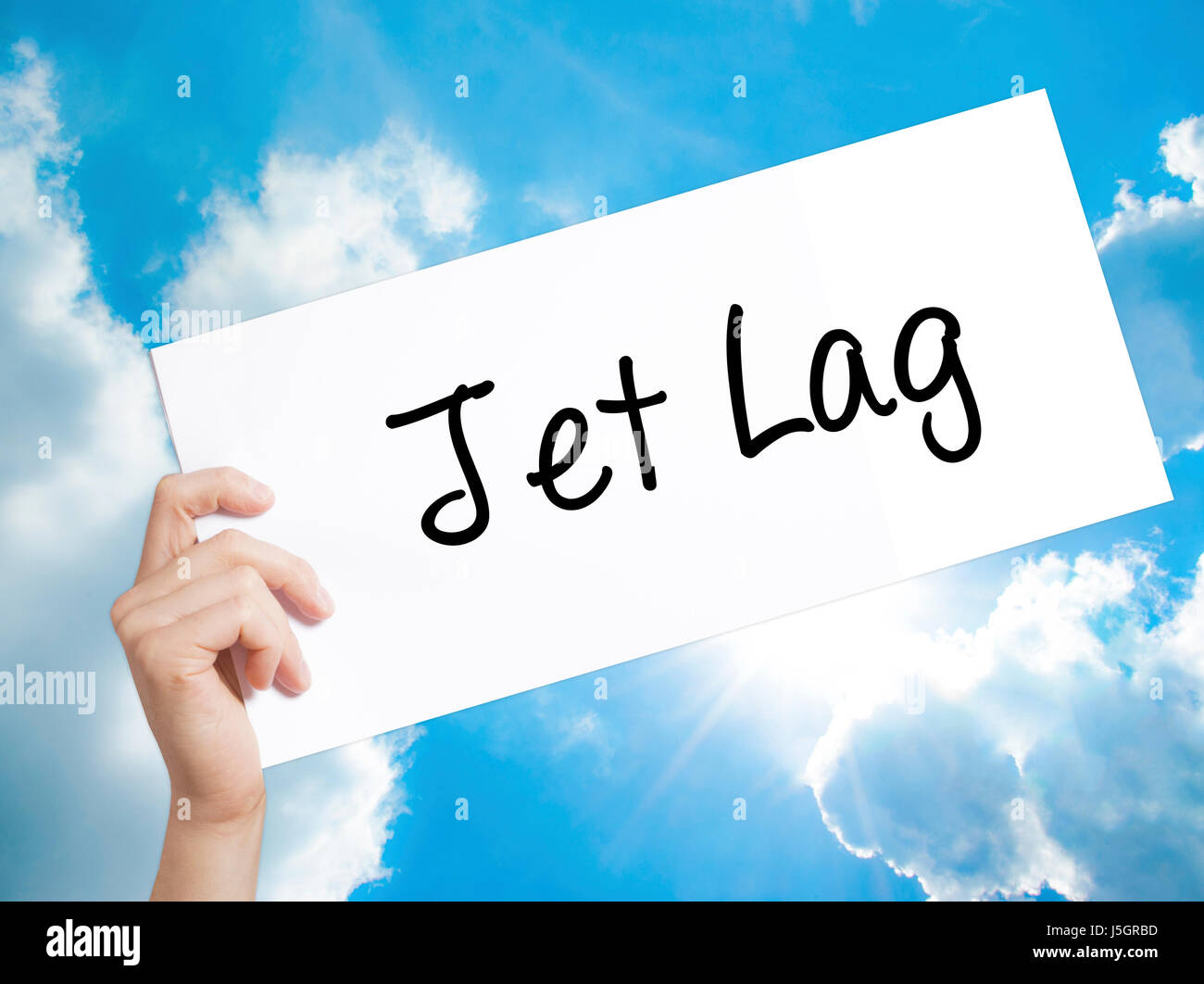 Jet Lag Sign on white paper. Man Hand Holding Paper with text. Isolated ...