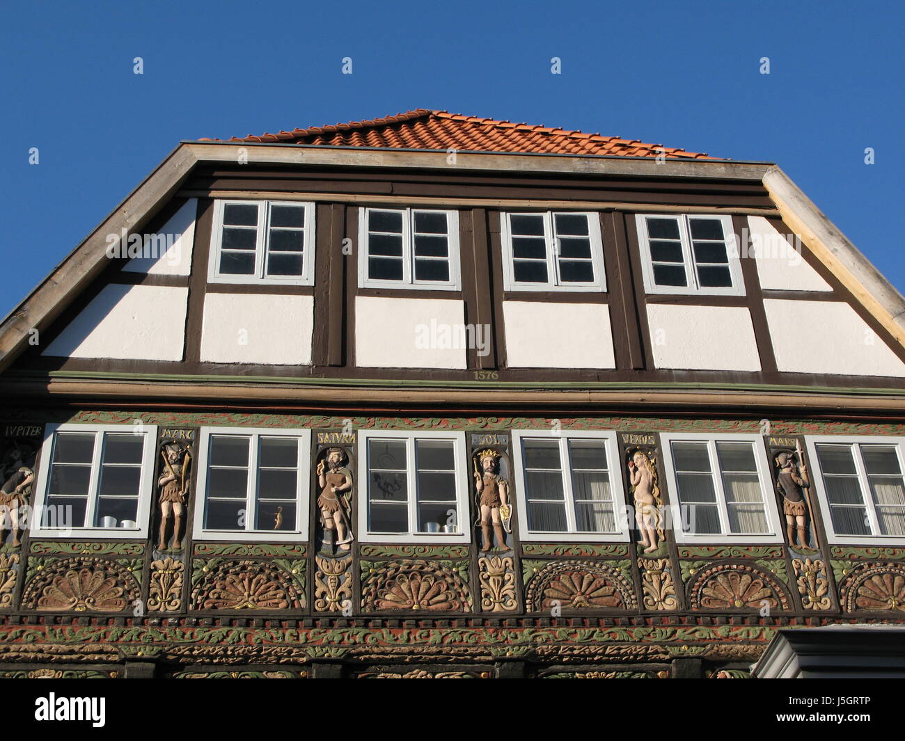 timbered gable with planetary figures Stock Photo - Alamy