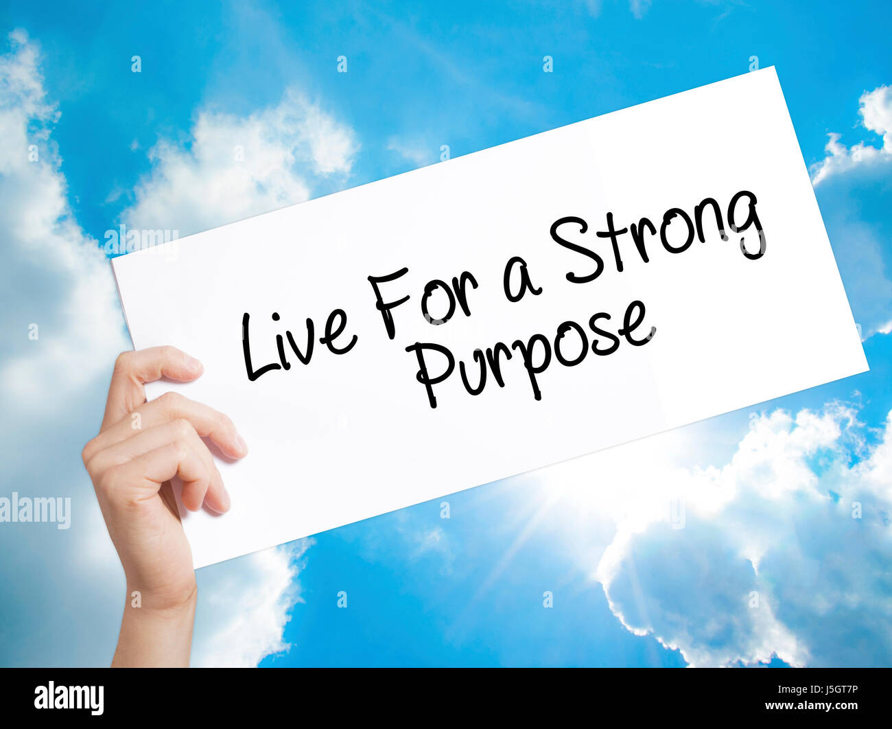 Live For a Strong Purpose Sign on white paper. Man Hand Holding Paper ...