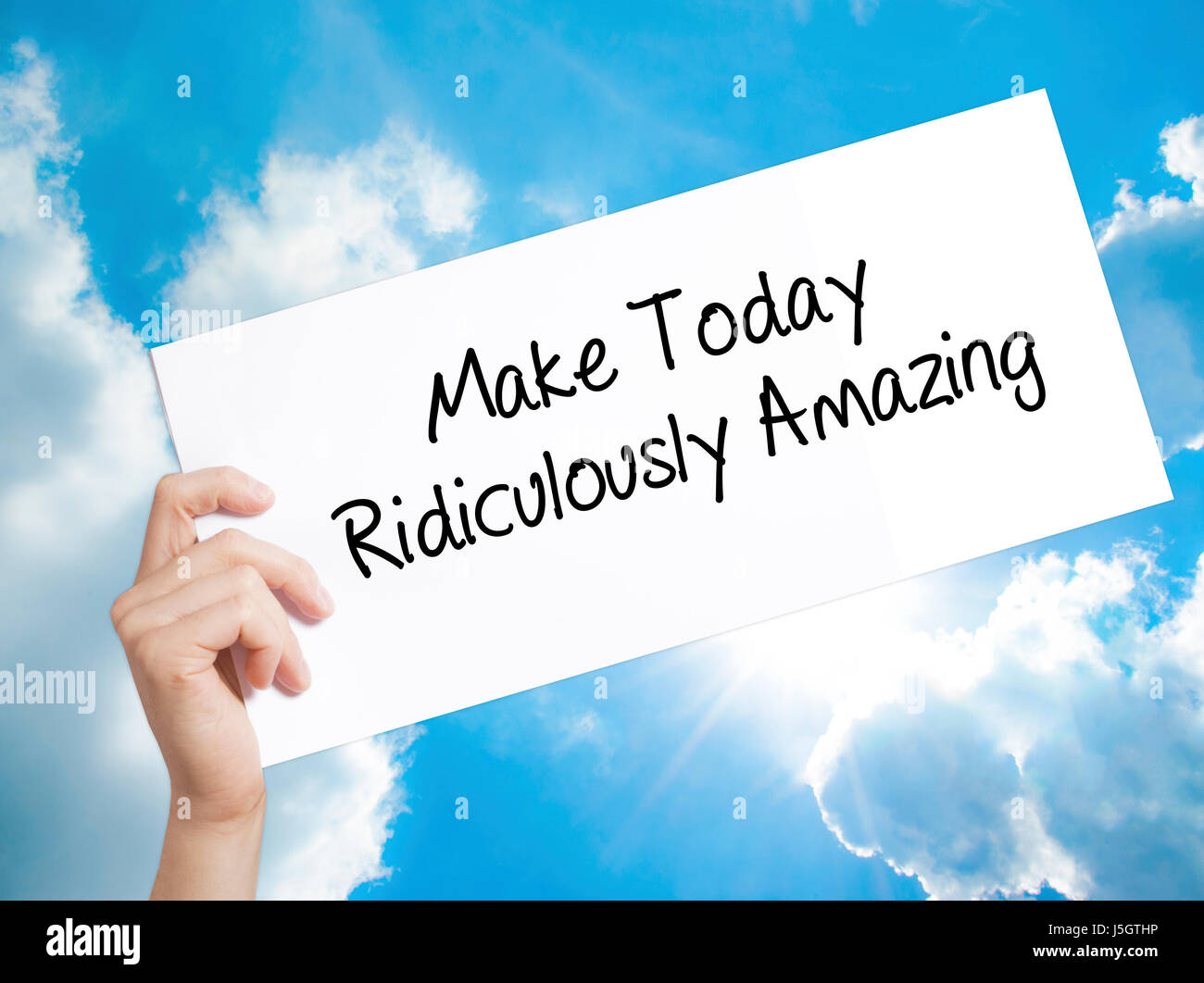 Make Today Ridiculously Amazing Sign on white paper. Man Hand Holding ...